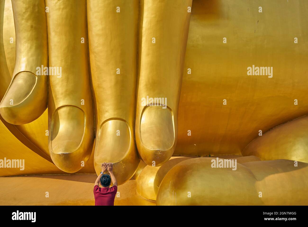 Buddhist Man at the Great Buddha of Thailand at Wat Muang near ...