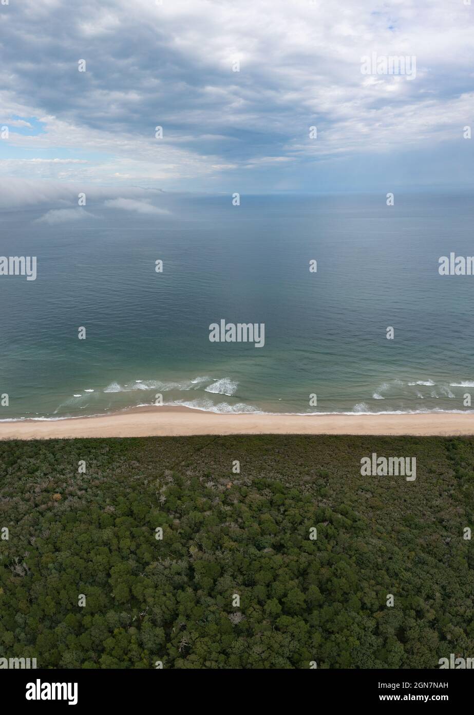The cold water of the Atlantic Ocean washes onto a scenic beach in ...