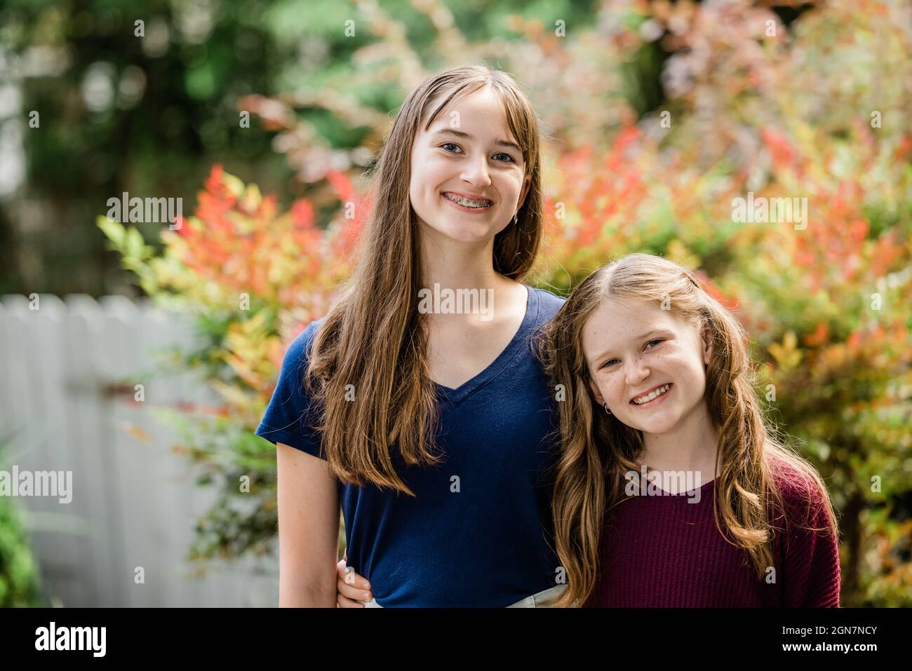Two sisters embracing hi-res stock photography and images - Alamy
