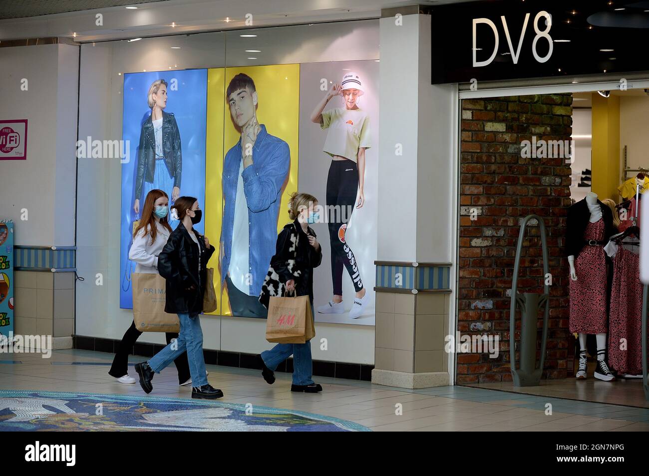 Shoppers enter DV8 store in Derry, Londonderry, Northern Ireland ...