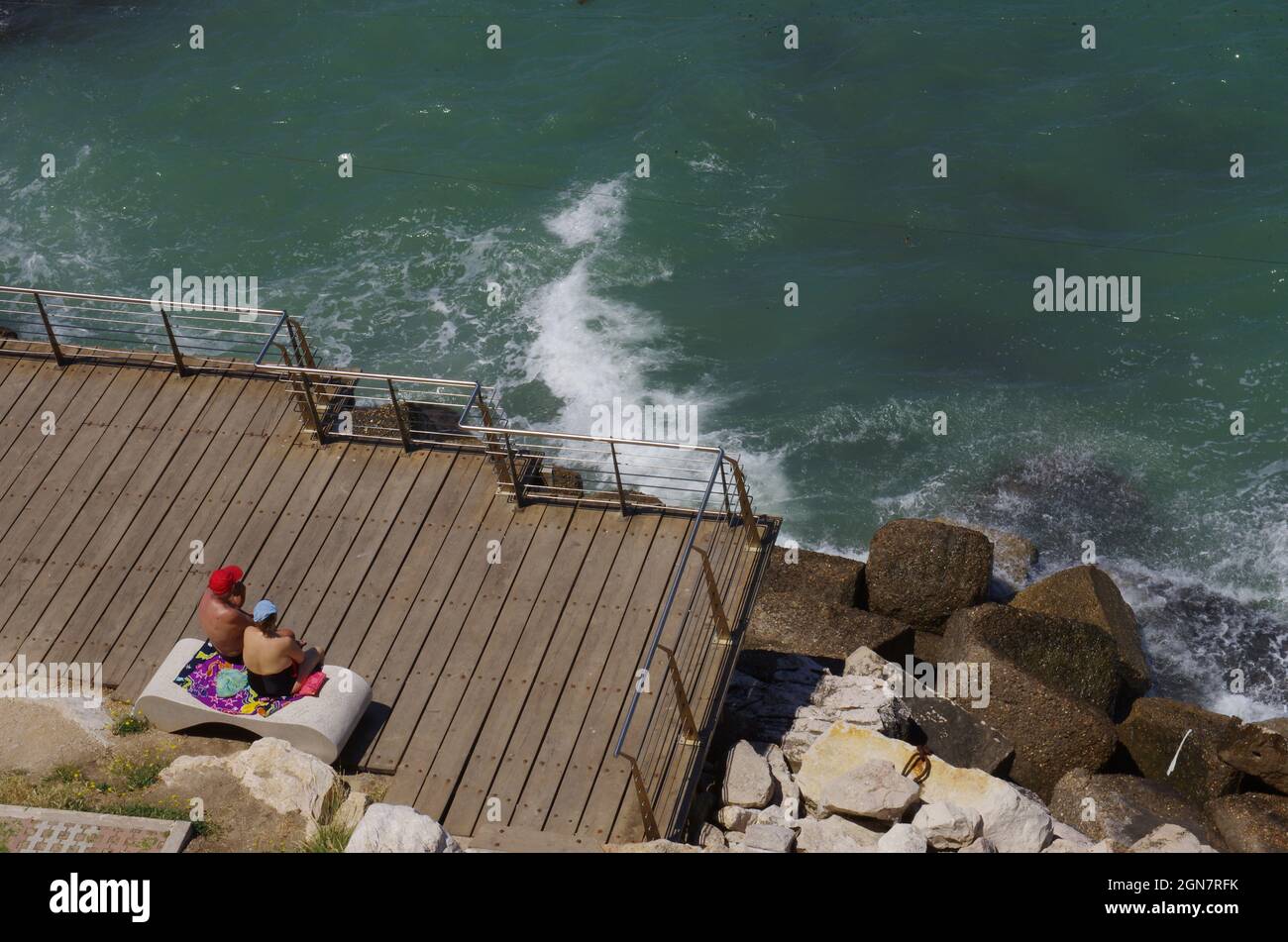 Bench sunbathe hi-res stock photography and images - Alamy