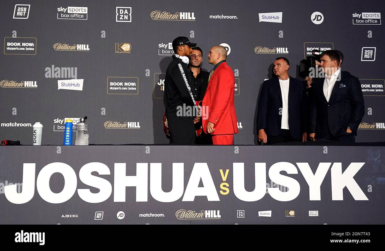 Anthony Joshua (left) and Oleksandr Usyk with Chairman of Matchroom ...