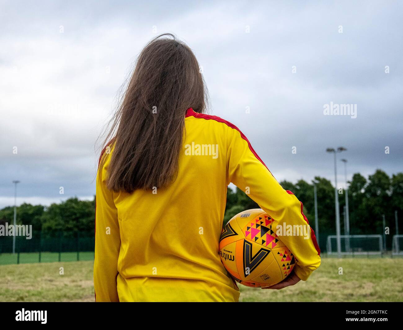 Glasgow, Scotland, UK. 15th July 2020: A Female footballer holding a ...