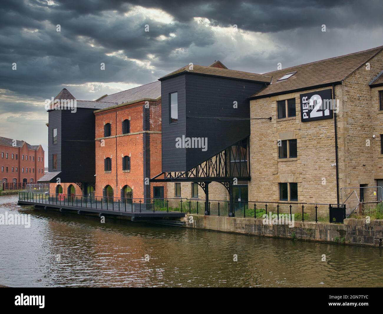 Warehouse buildings at Wigan Pier on the Leeds - Liverpool Canal. Now ...