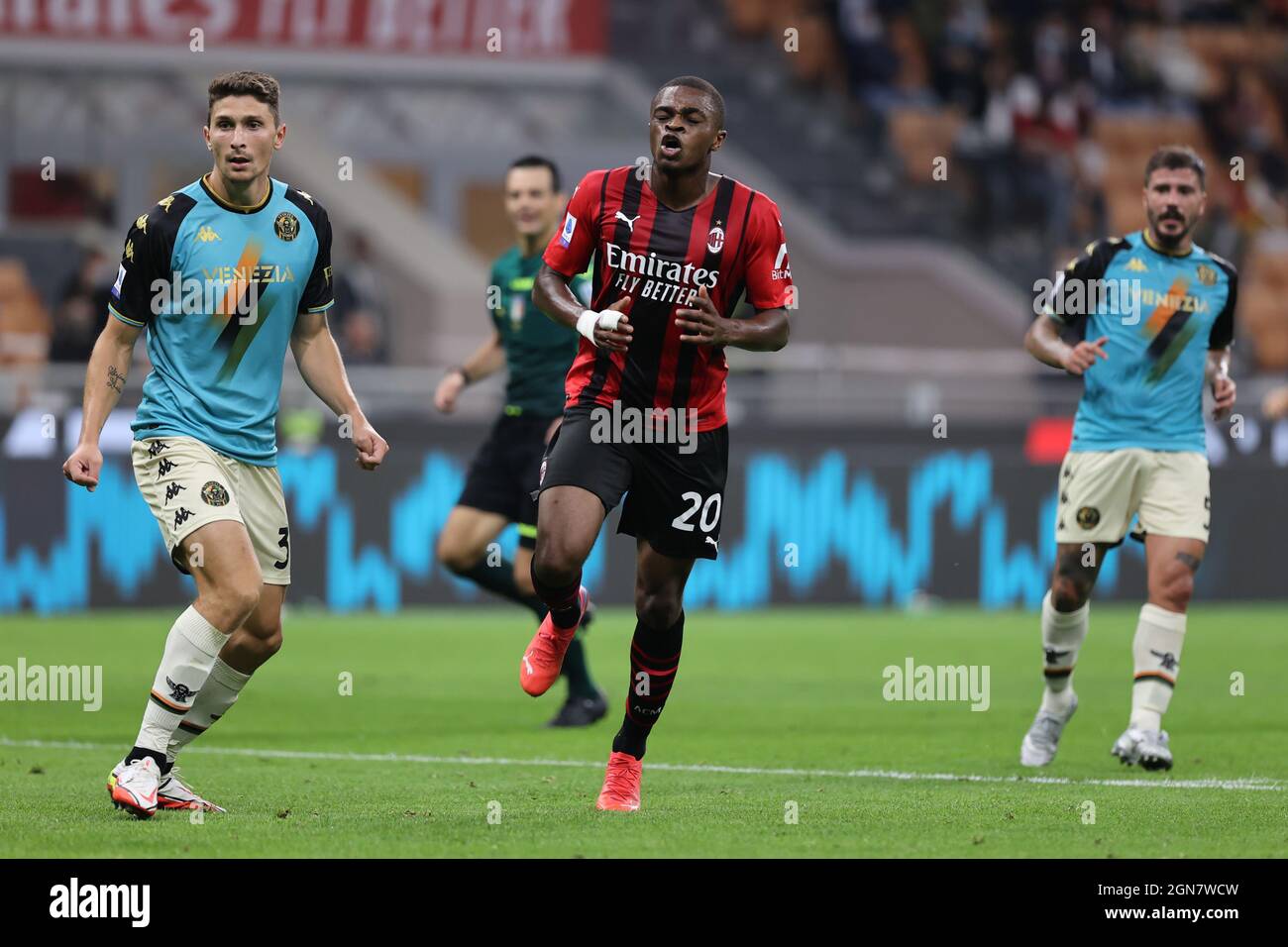 Pierre Kalulu of AC Milan and Mattia Calandra of Venezia FC in action ...