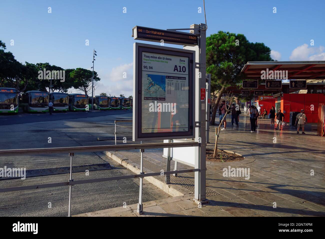 Valletta, Malta Public Transport Buses at terminal with crowd. Green ...