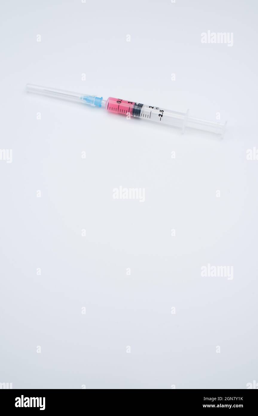 isolated sterilized injection syringe on a white background Stock Photo ...