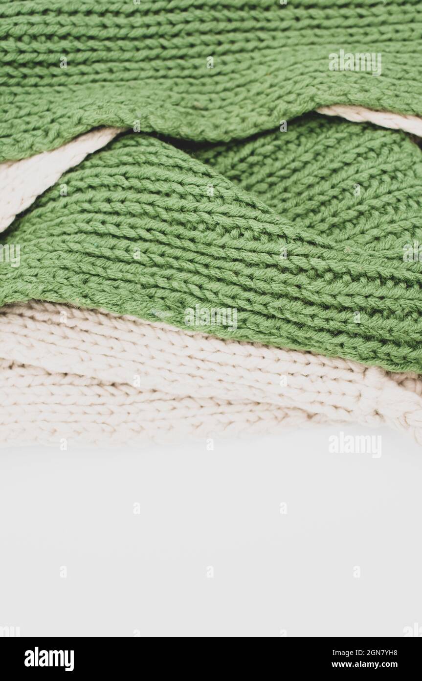 knitted soft natural wool on a white background Stock Photo - Alamy
