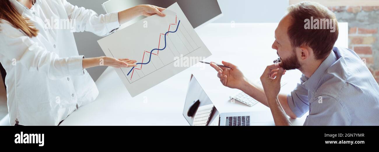 Motivated business team of two employee working together in office ...