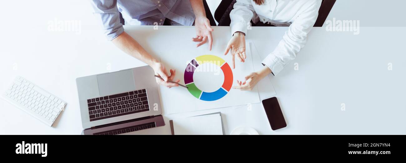 Motivated business team of two employee working together in office ...