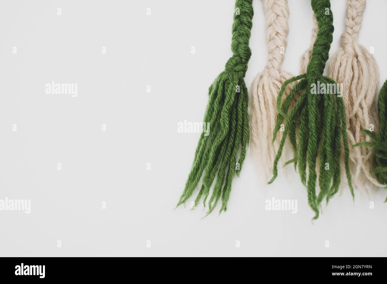 knitted soft natural wool on a white background Stock Photo - Alamy