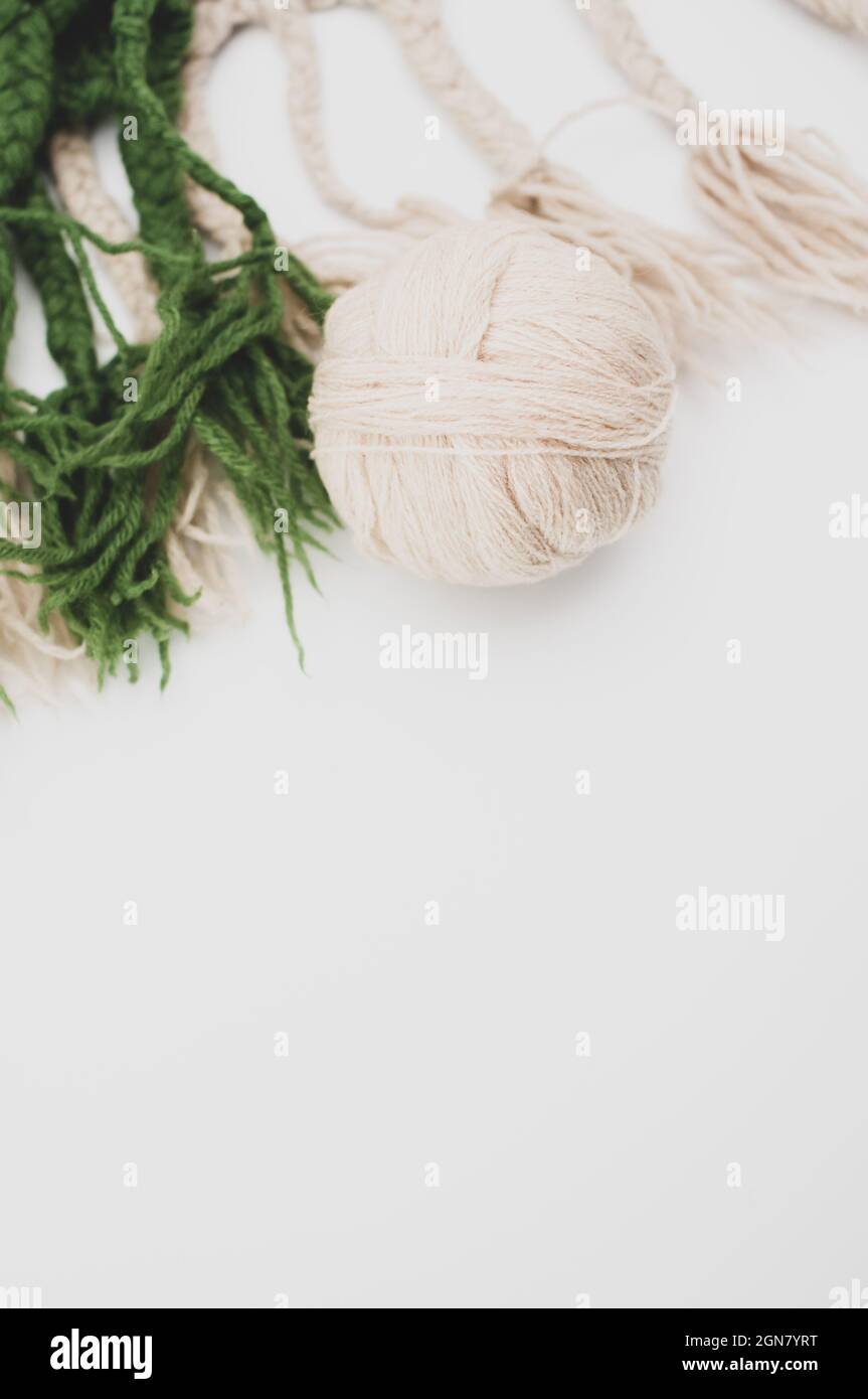 knitted soft natural wool on a white background Stock Photo - Alamy