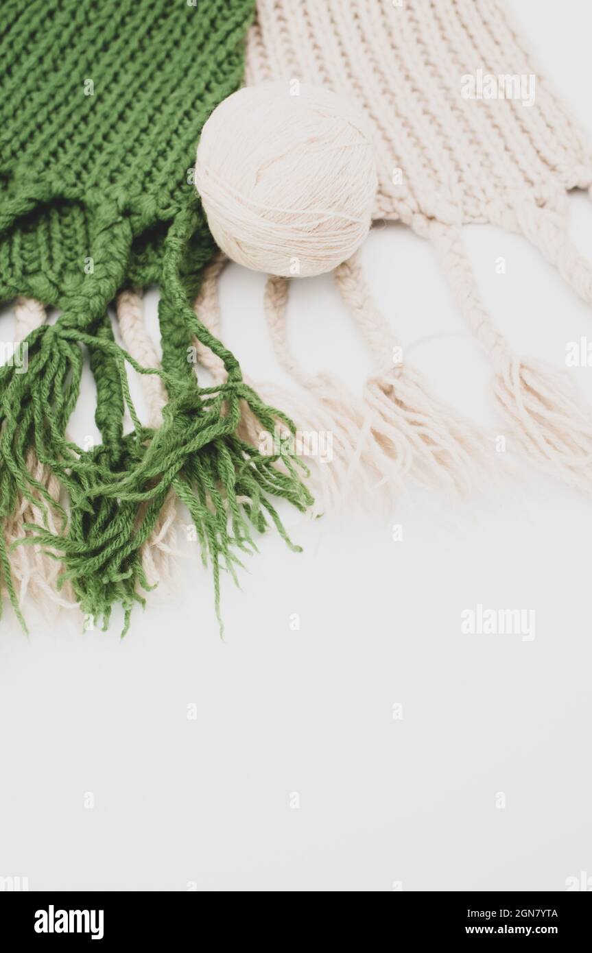 knitted soft natural wool on a white background Stock Photo - Alamy