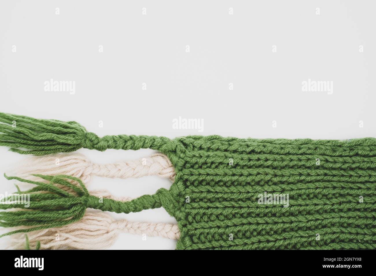 knitted soft natural wool on a white background Stock Photo - Alamy