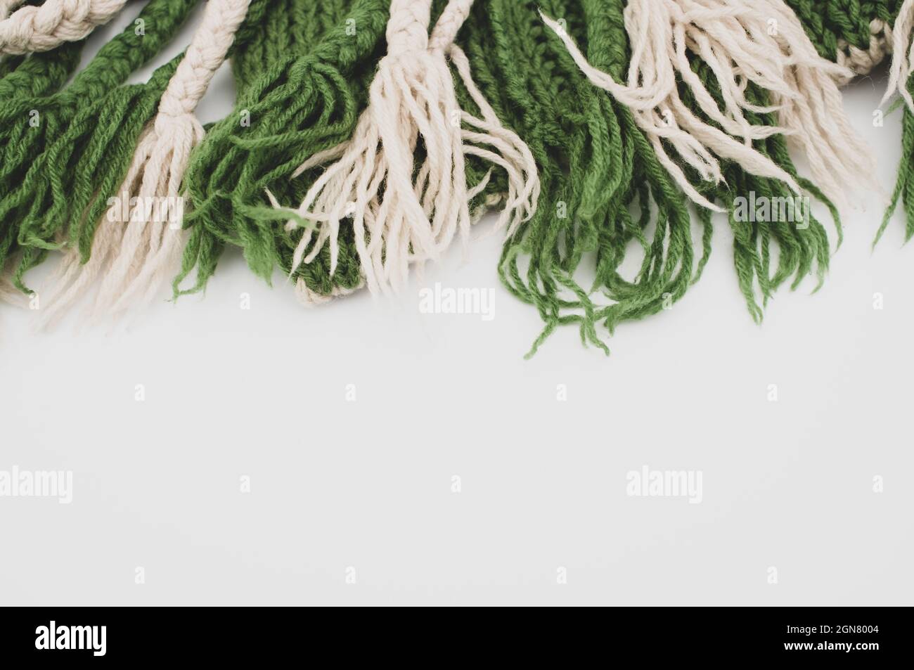 knitted soft natural wool on a white background Stock Photo - Alamy