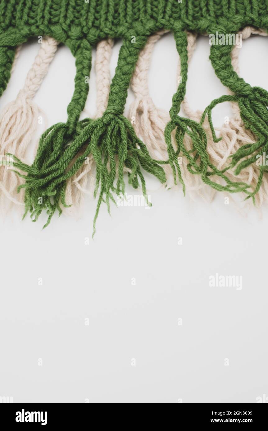 knitted soft natural wool on a white background Stock Photo - Alamy