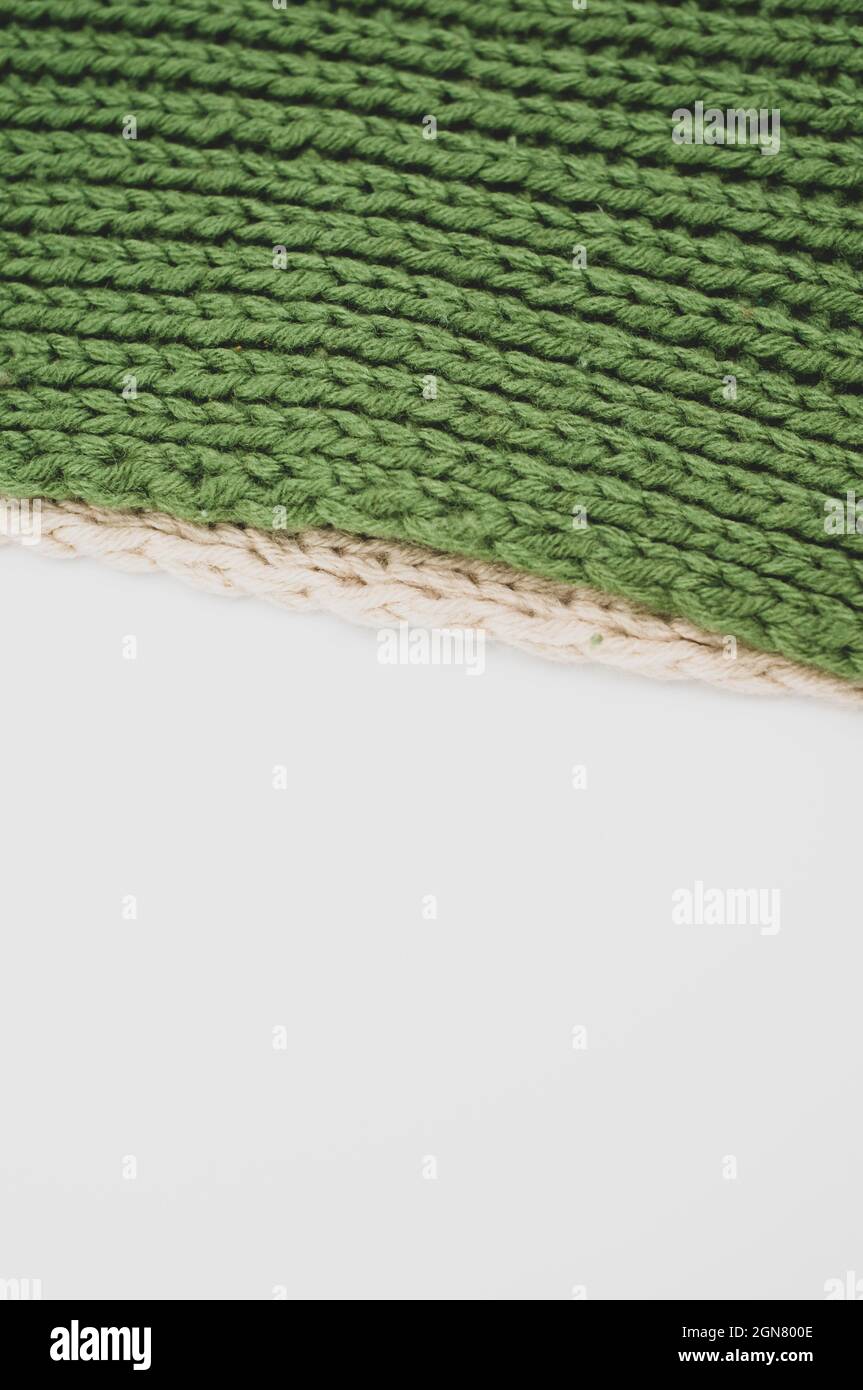 knitted soft natural wool on a white background Stock Photo - Alamy