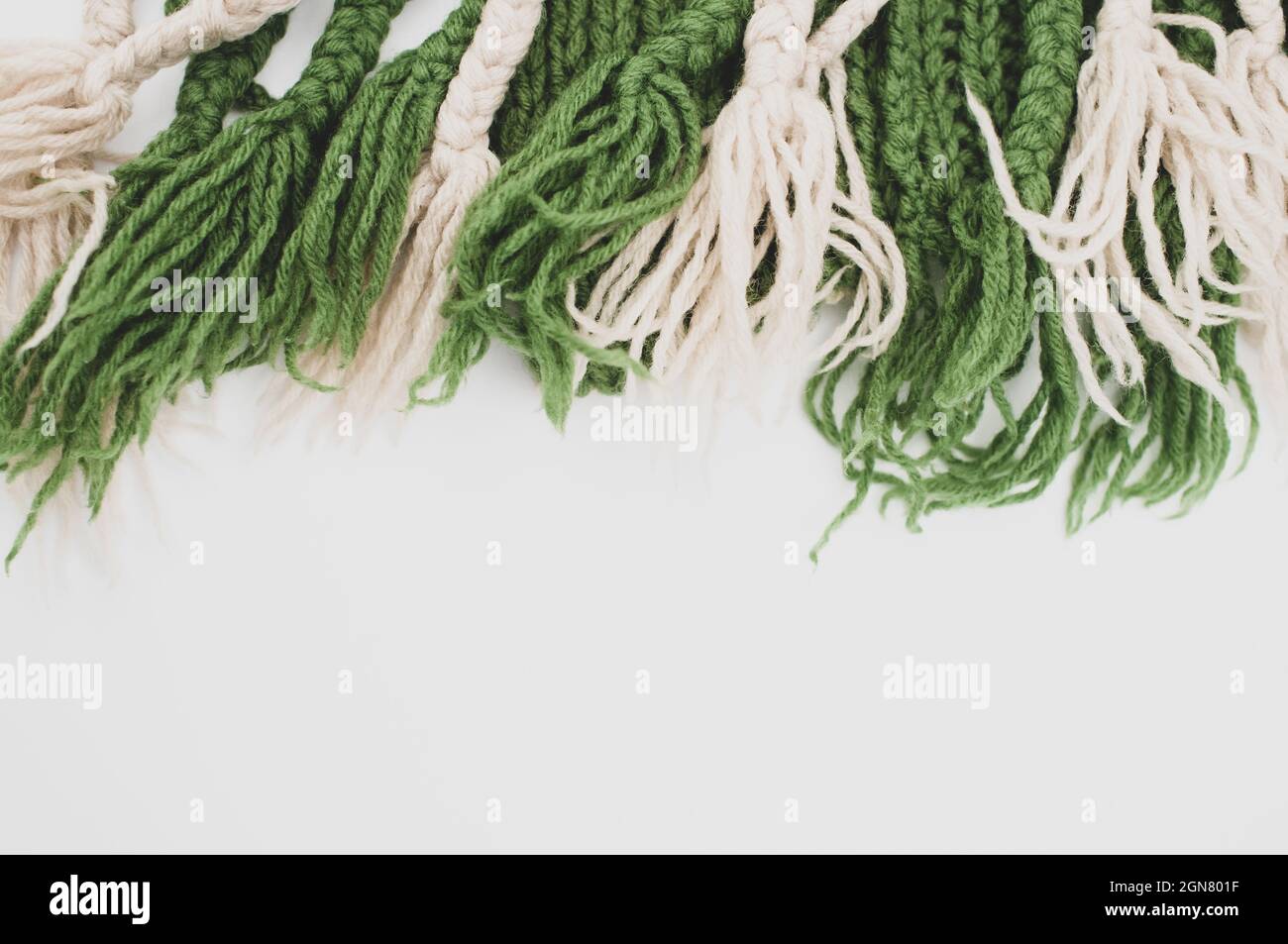 knitted soft natural wool on a white background Stock Photo - Alamy