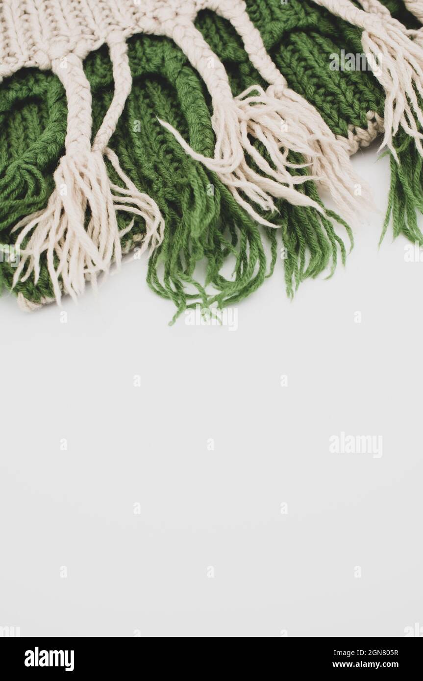 knitted soft natural wool on a white background Stock Photo - Alamy
