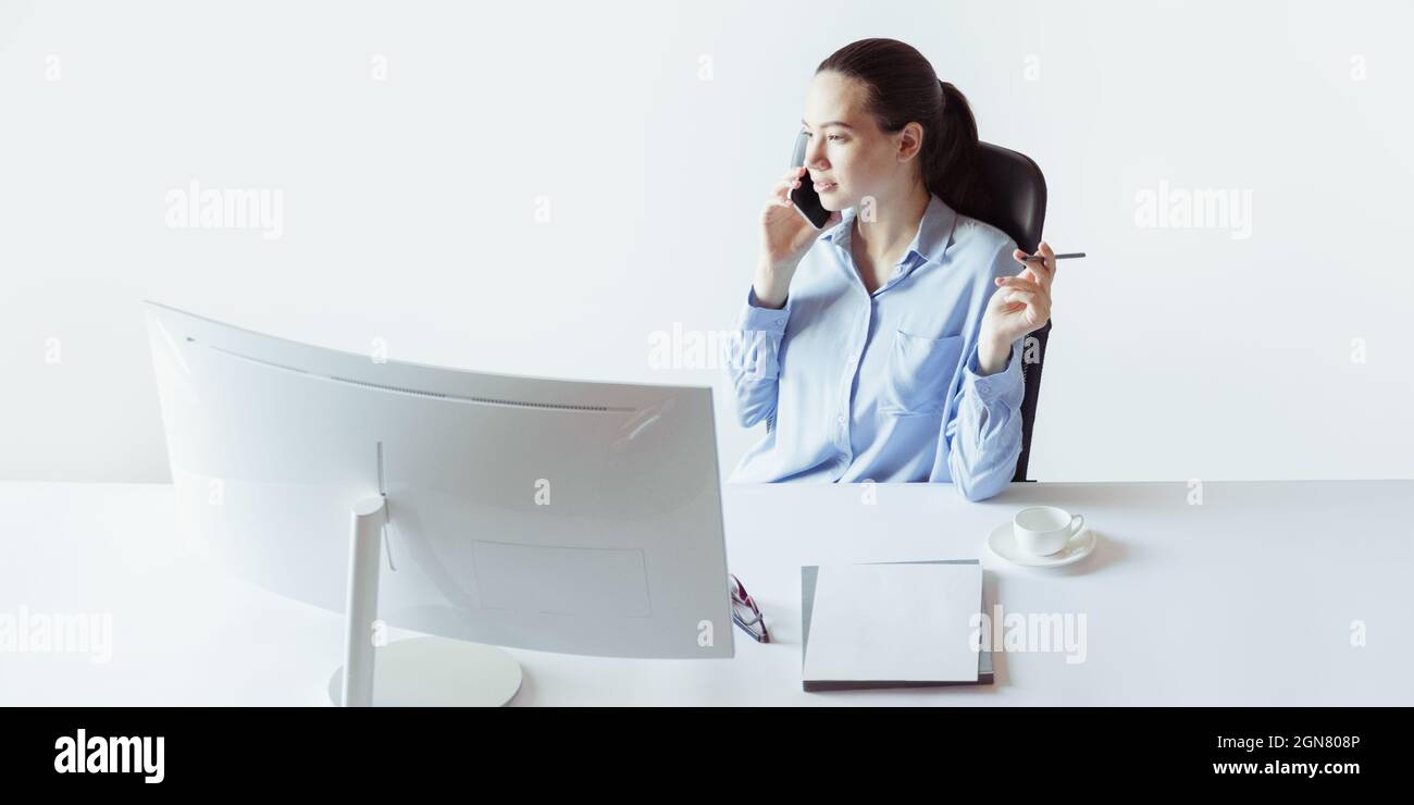 Female employee working with computer, creating and processing ideas in ...