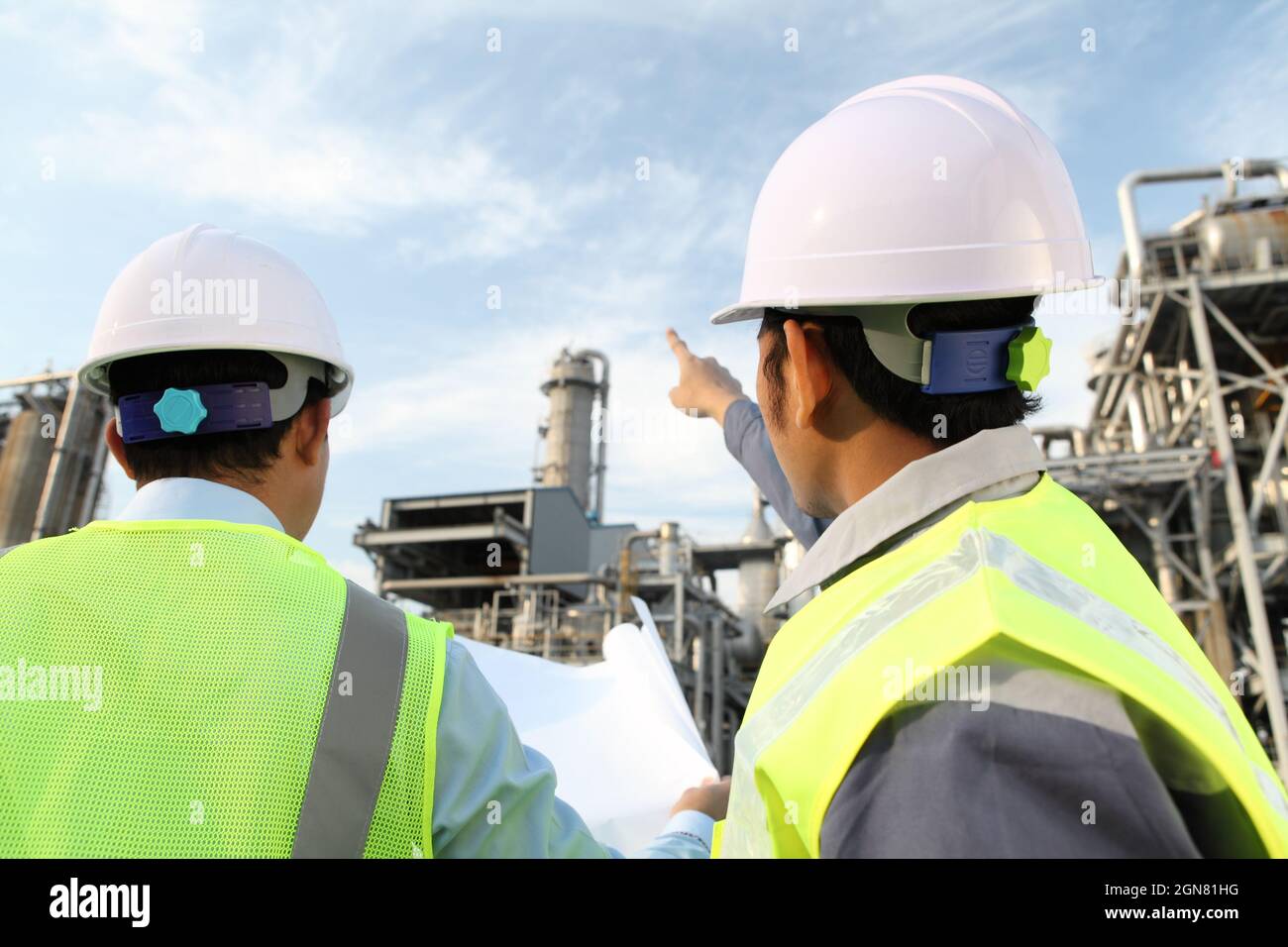 two engineer discussion about plan working on location site Stock Photo ...