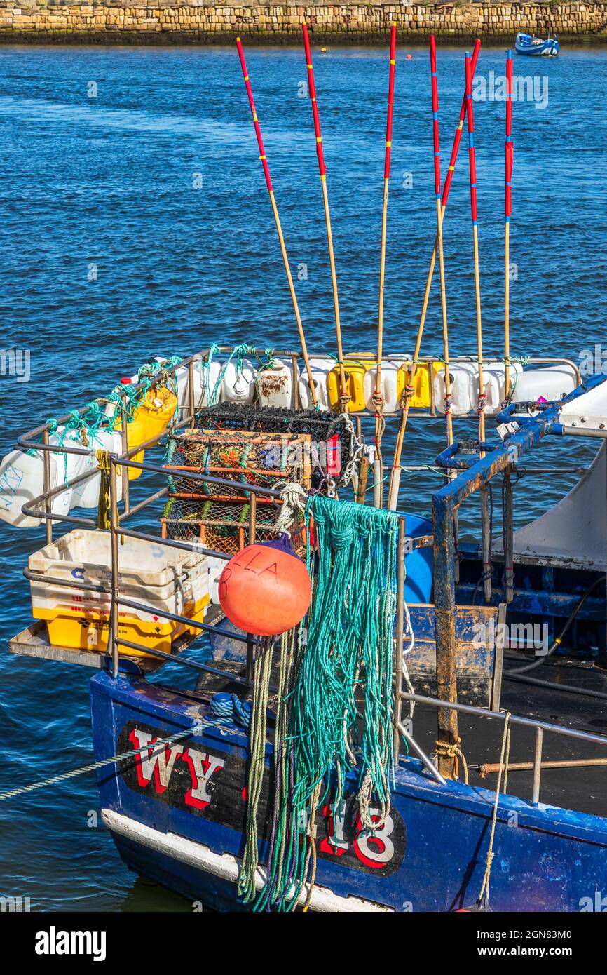 Detail at the hull of a fishing boat in Whitby harbour, Redcar and ...
