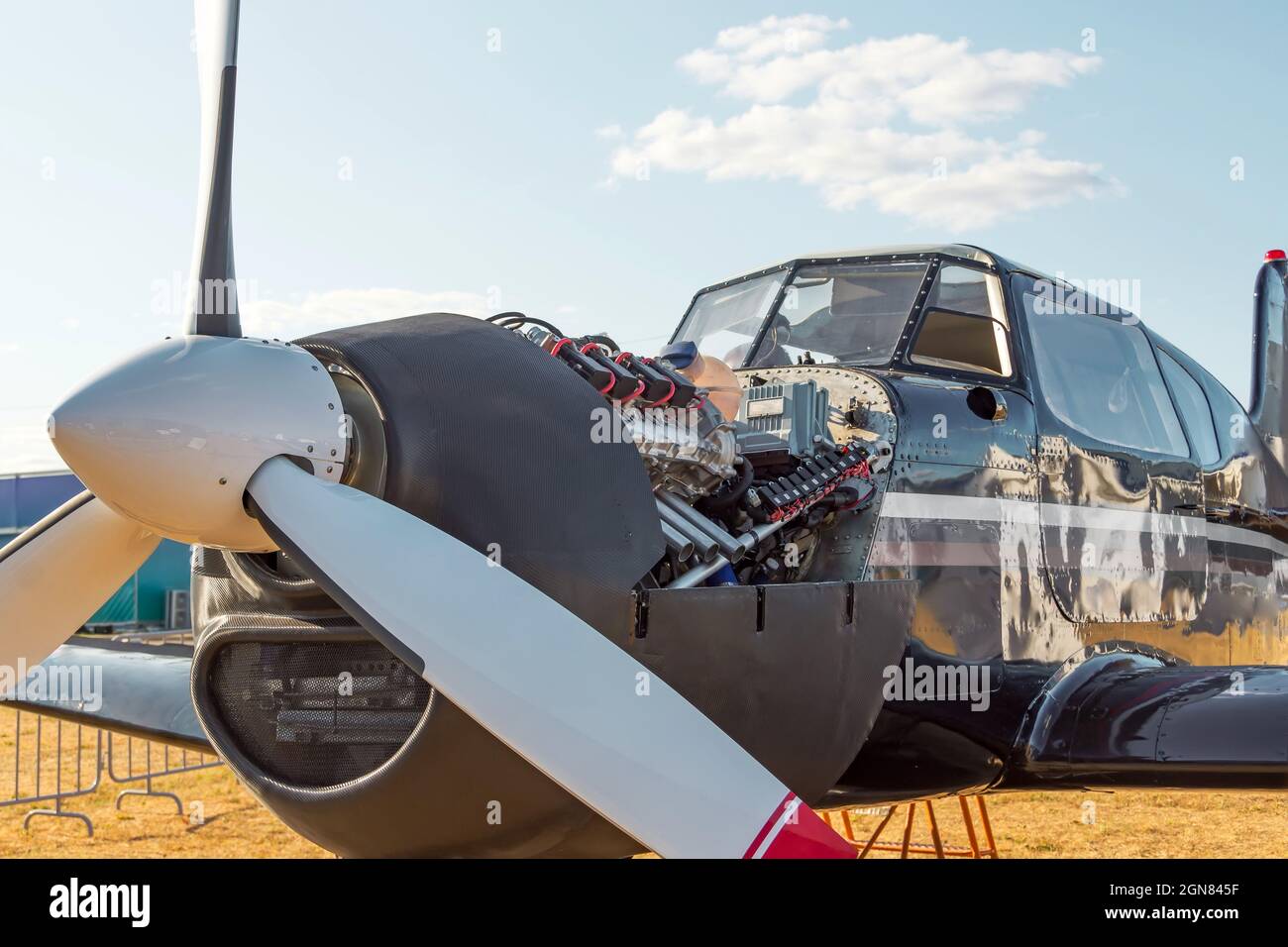 Light engine aircraft with an open engine hood, the device is the ...