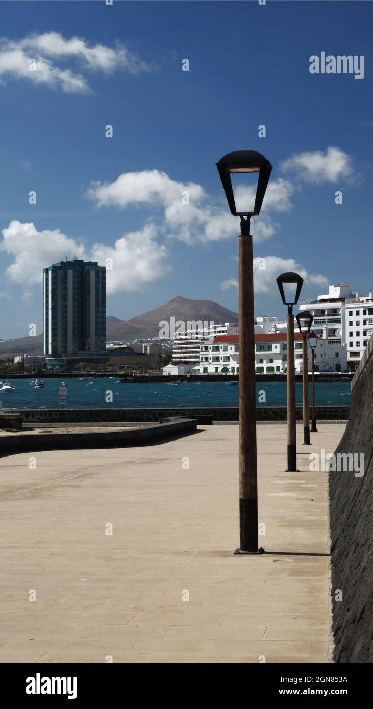 Modern street lanterns, street lights, on the shore in front of the ...