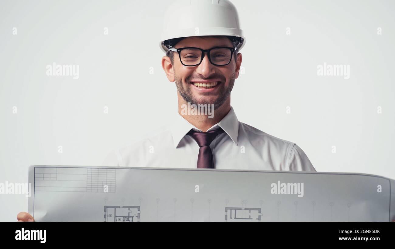 Cheerful handsome engineer holding copy hi-res stock photography and ...
