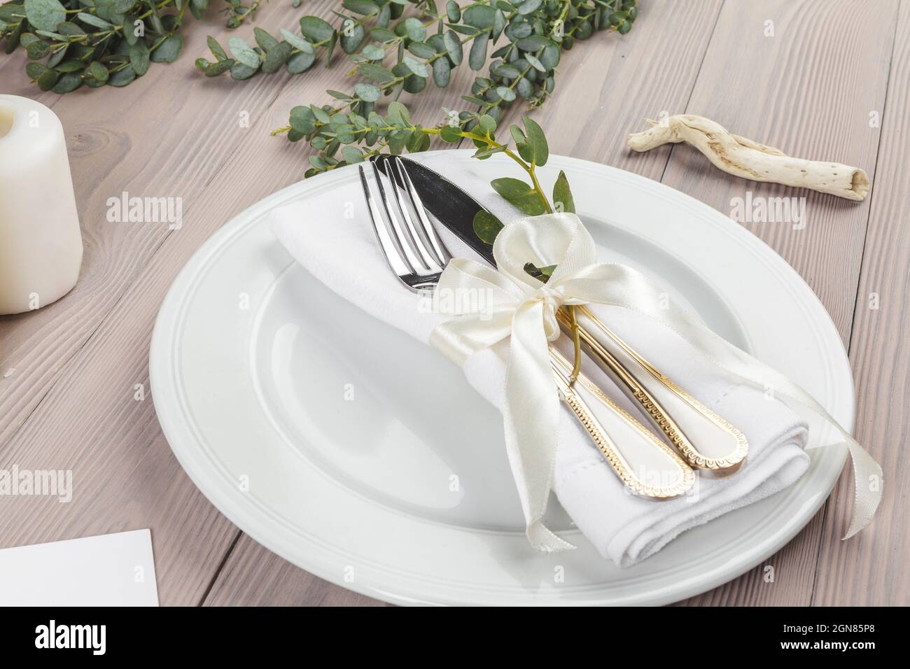 Beautiful table setting on wooden table from above Stock Photo - Alamy