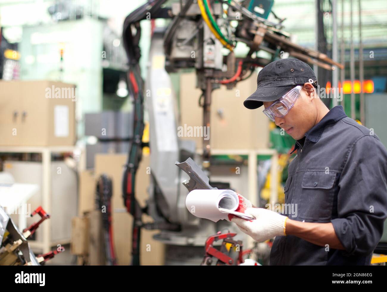 Metal manufacturing factory workers checking hi-res stock photography ...