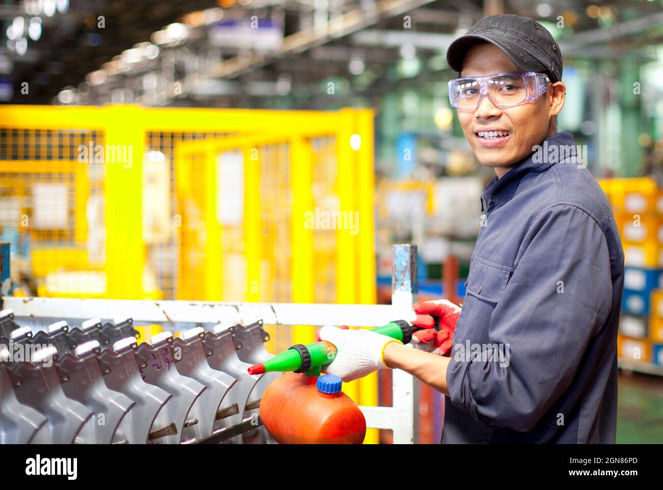Factory worker on working Stock Photo - Alamy
