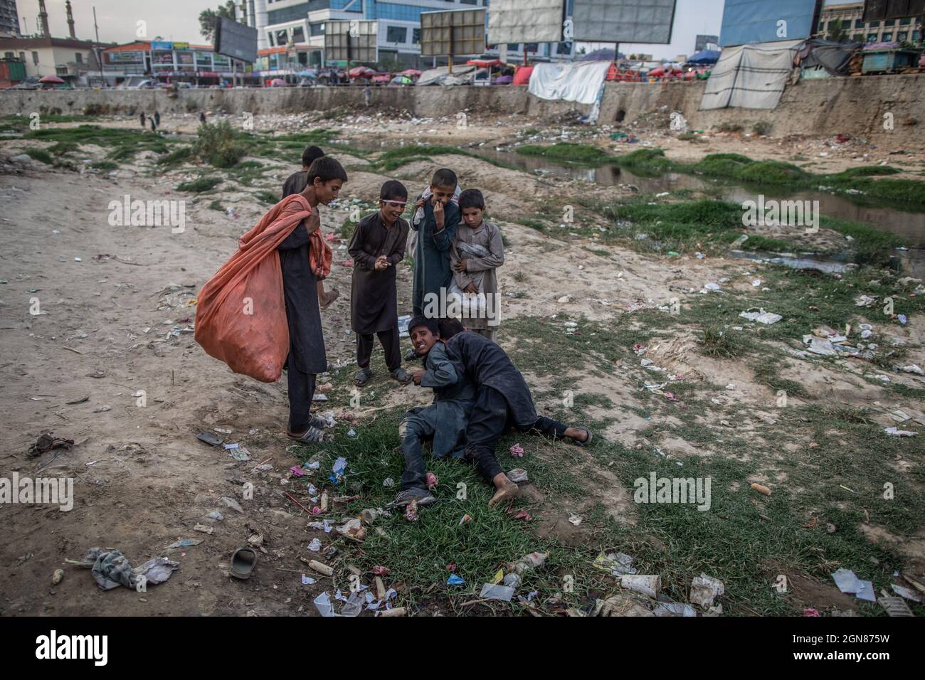 Kabul, Afghanistan. 23rd Sep, 2021. Two young Afghan boys, living below ...