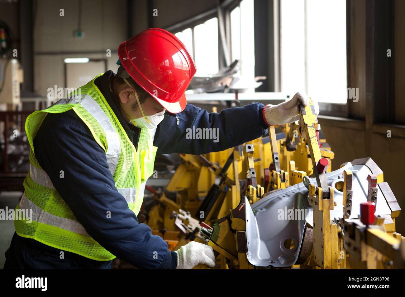 Manufacturing worker asian mechanical engineer hi-res stock photography ...