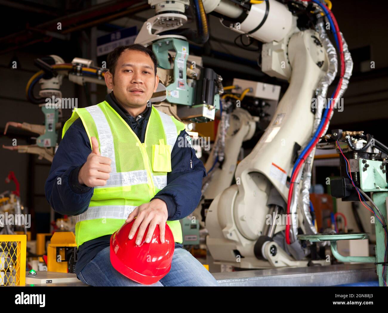 Factory worker robot machine hi-res stock photography and images - Alamy