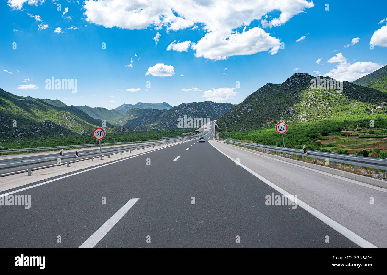 Scenic road. Road is surrounded by a magnificent natural landscape ...