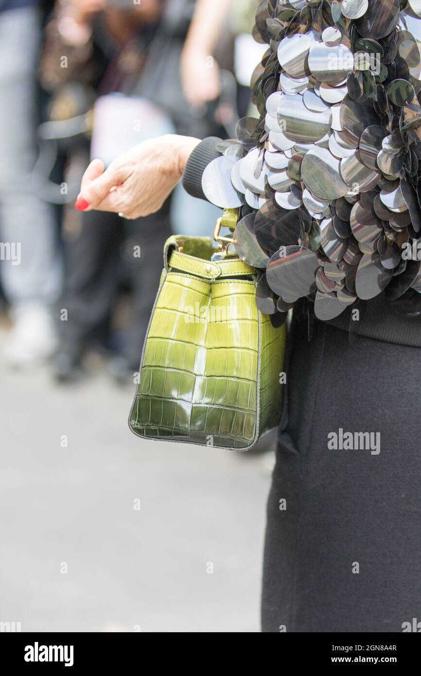 September 21, 2021: Model wears a green python handbag Stock Photo - Alamy