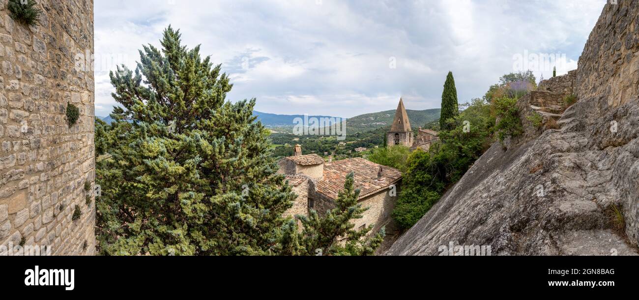 Panoramic view on the medieval little town, church and valley from the ...