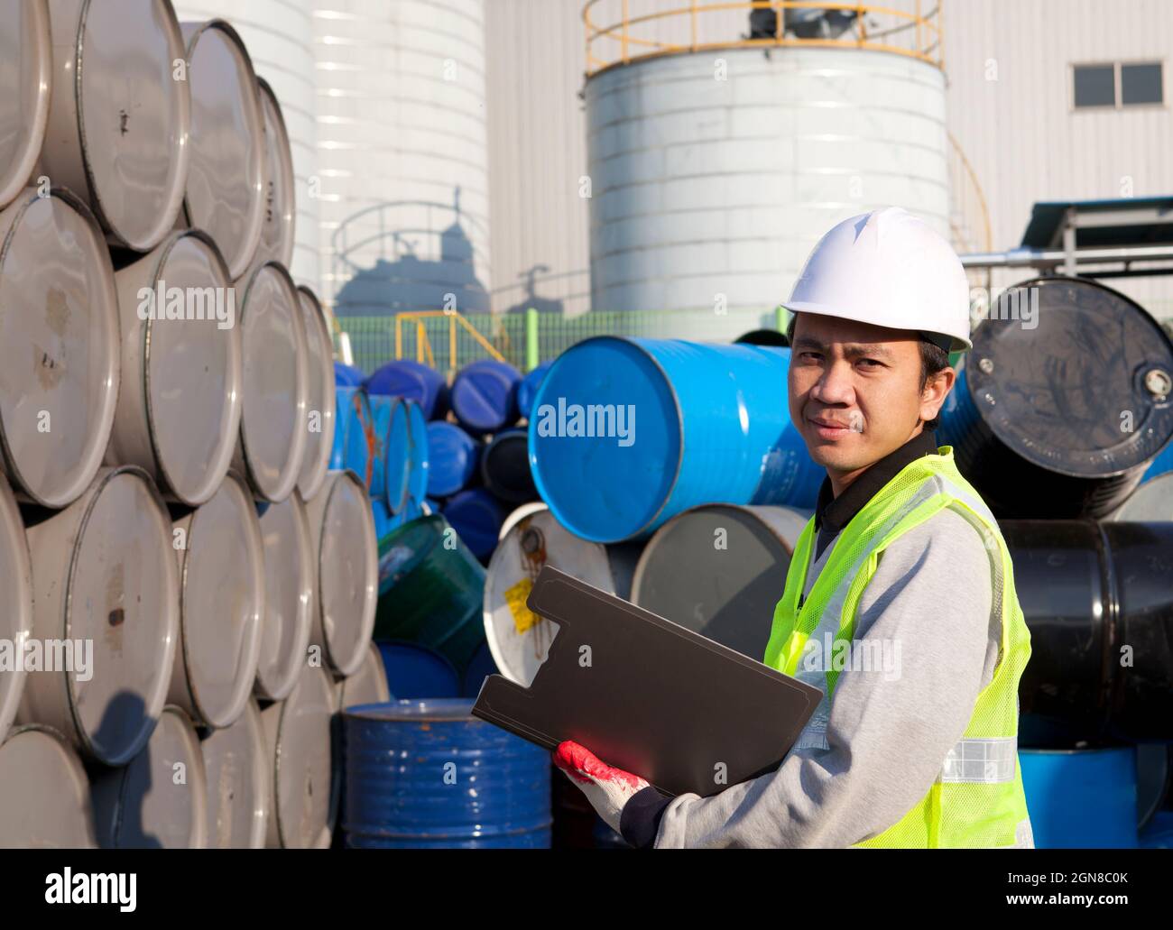 Smiling supervisor holding empty hi-res stock photography and images ...