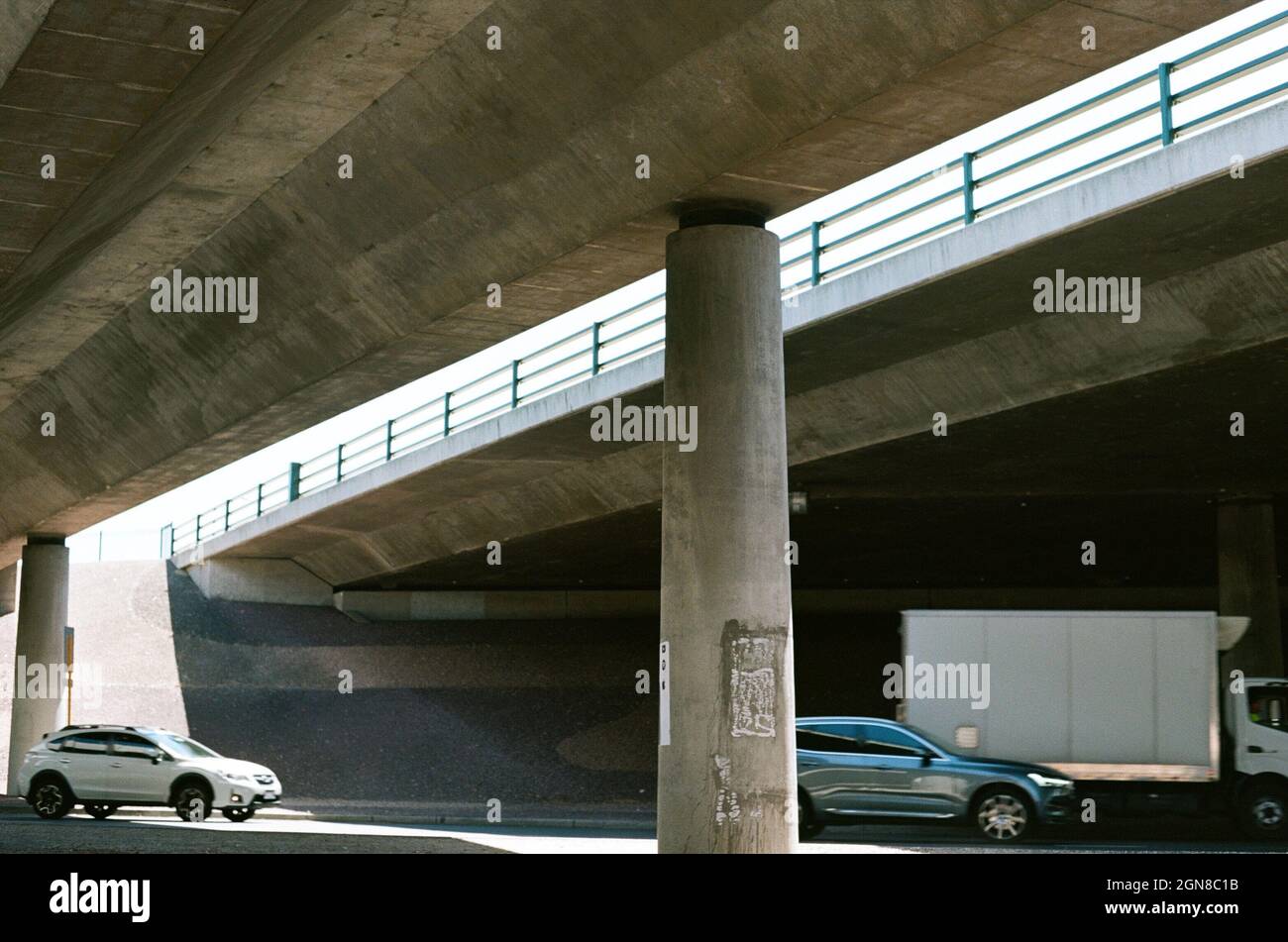 Road under a concrete overpass in the morning Stock Photo - Alamy