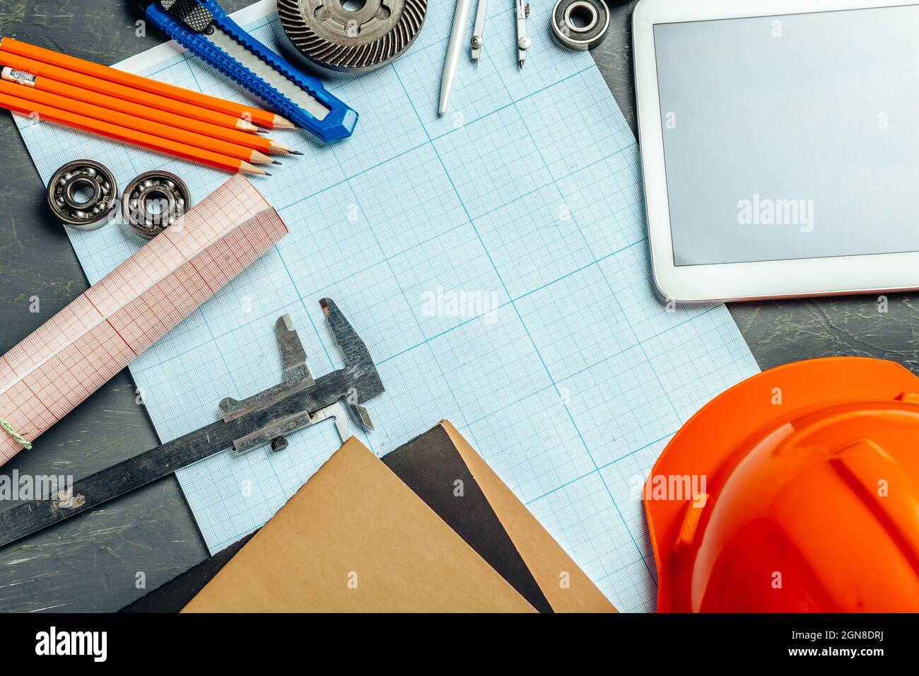 Car engineering tools top view on graph paper Stock Photo - Alamy