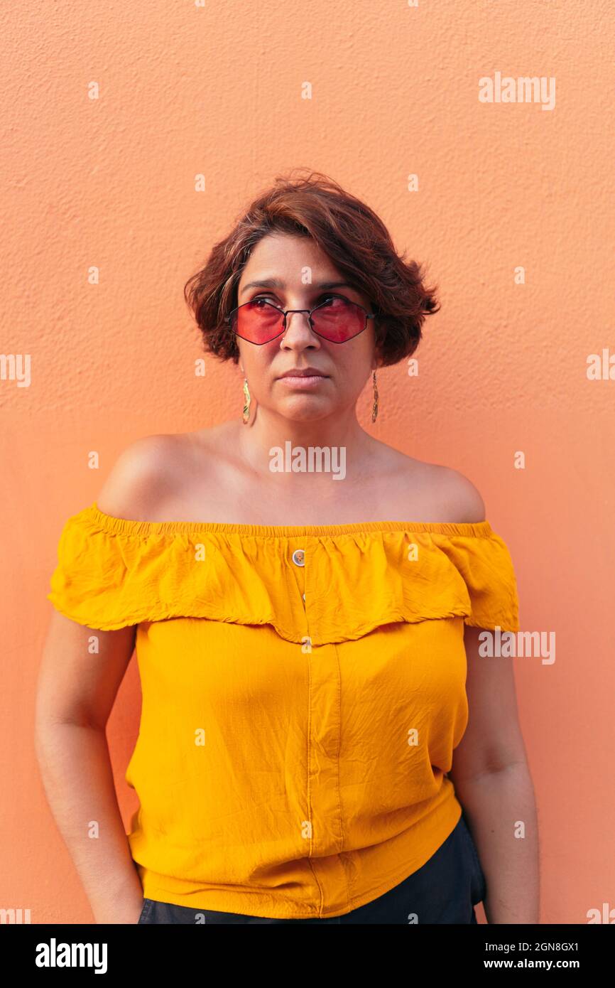 Stylish caucasian woman in orange hi-res stock photography and images ...