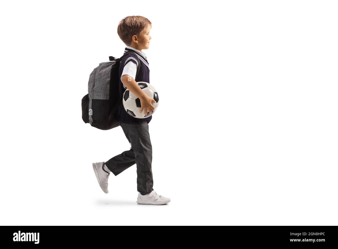 Schoolboy walking profile hi-res stock photography and images - Alamy