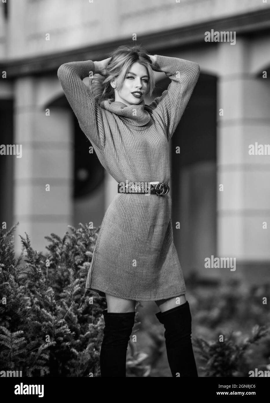 Pretty model in sweater Black and White Stock Photos & Images - Alamy