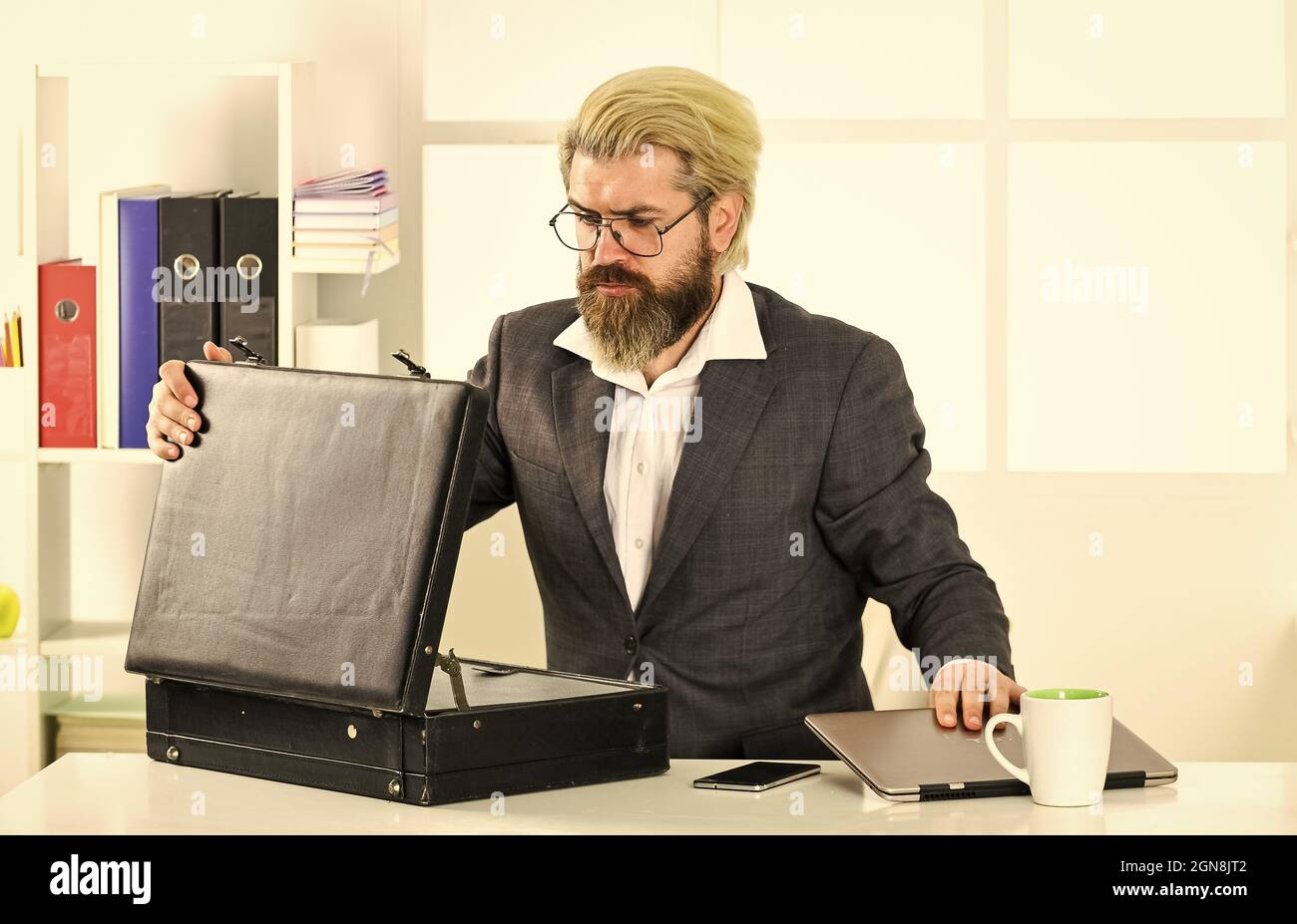 corruption. Businessman hand holding briefcase. suitcase with money ...