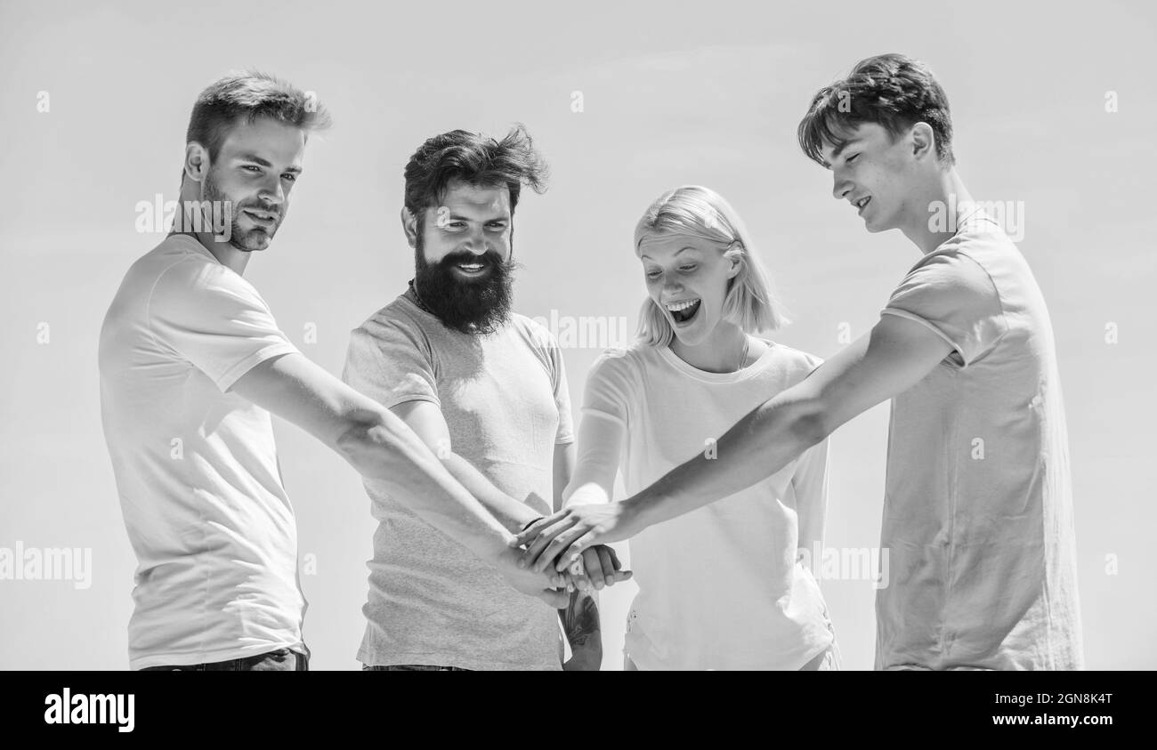 Dream team. Community member. Cheerful guys and girl. group of four ...