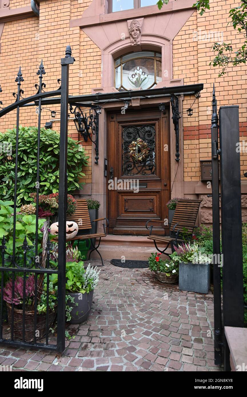 House entrance of a villa in the style of historicism, autumnal ...