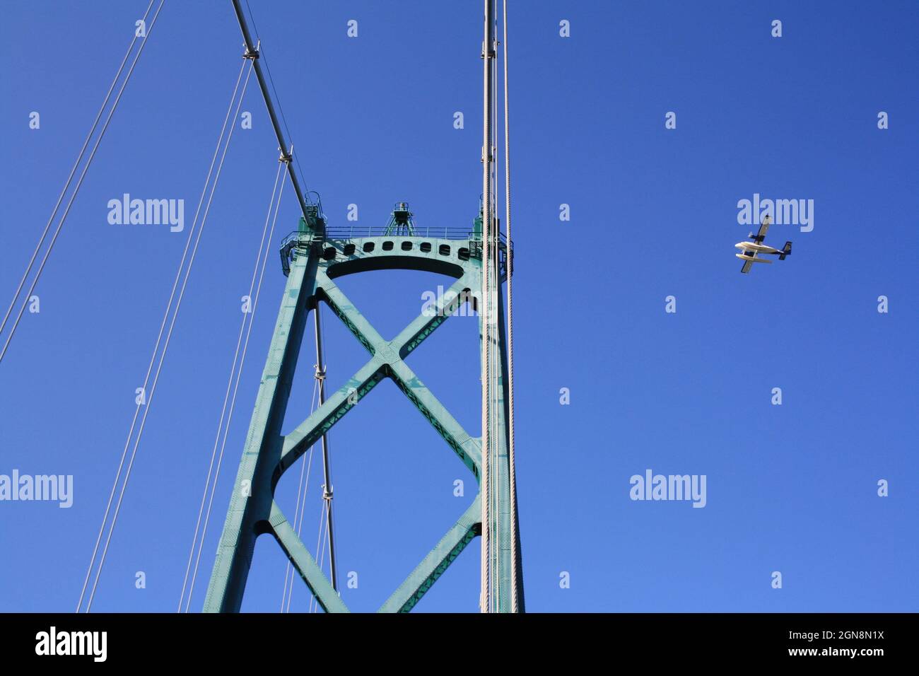 VANCOUVER, CANADA - Sep 01, 2021: A low angle shot of a plane flying ...