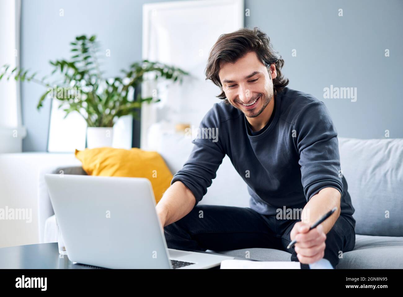 Male working from home dark hi-res stock photography and images - Alamy