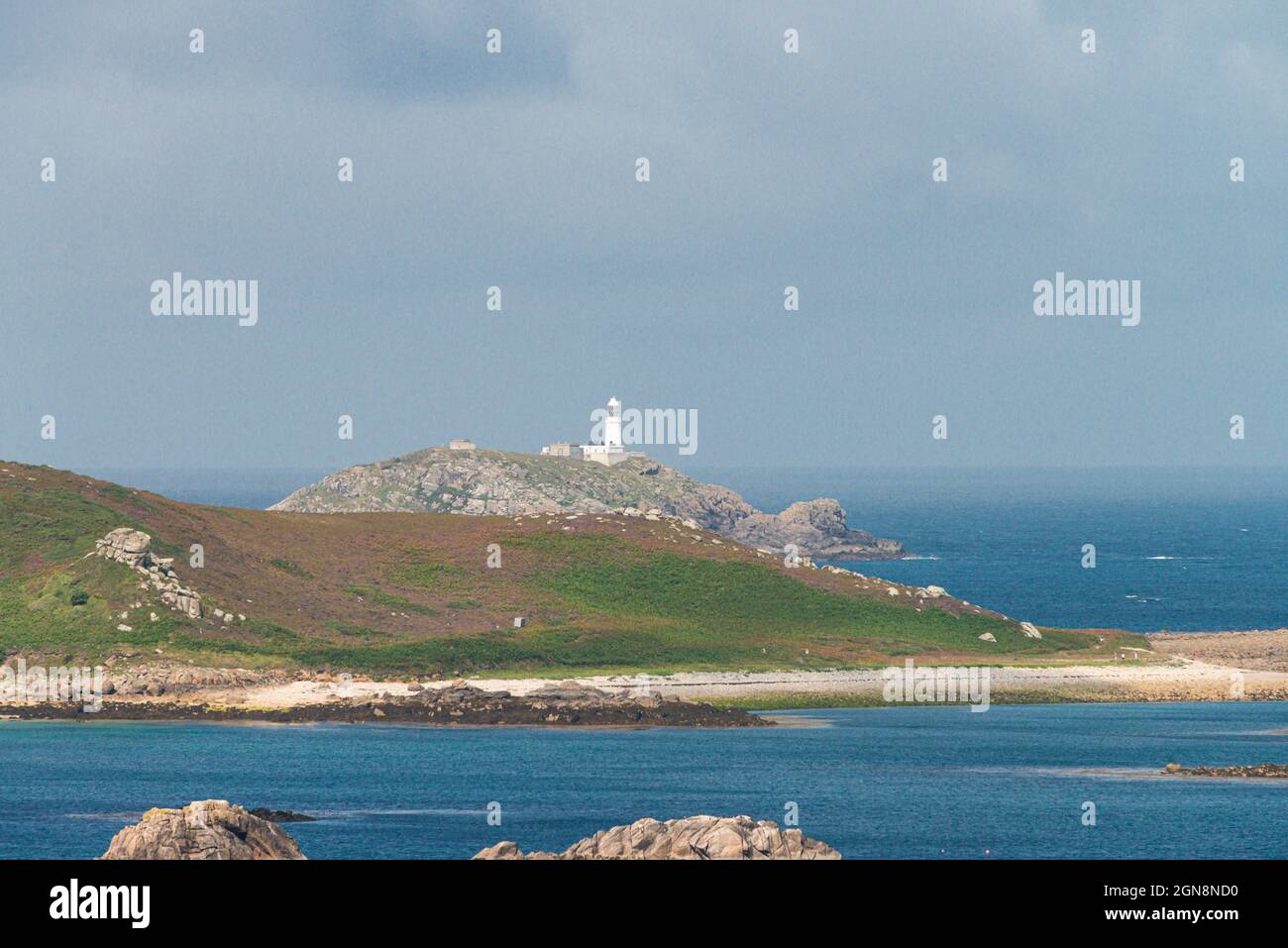 Round Island Lighthouse seen from St Martin's, Isles of Scilly Stock ...